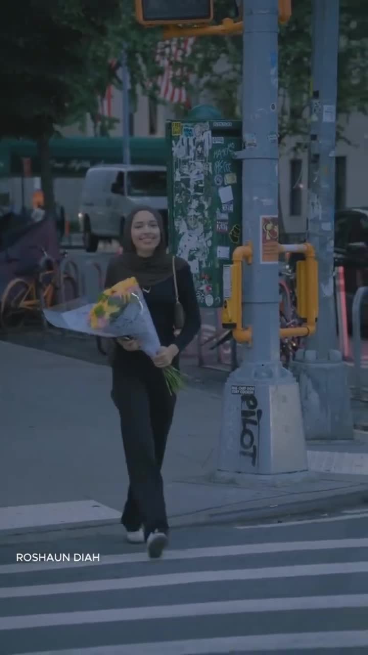 Giving a random beautiful woman a bouquet of flowers