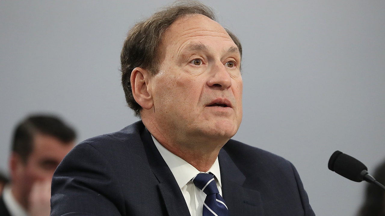 Alito presses trans female athlete's lawyer on definition of woman ...