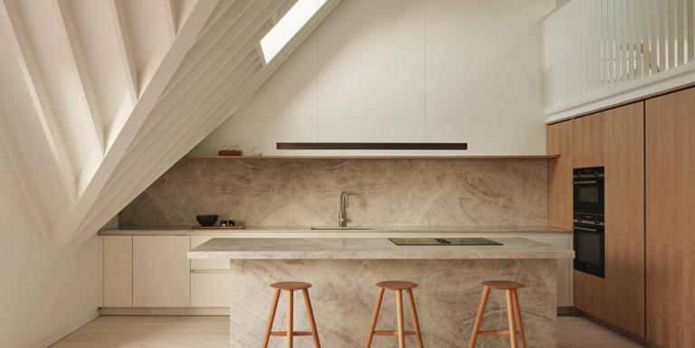 Inside the Hampstead loft conversion with a roof like the upturned hull ...