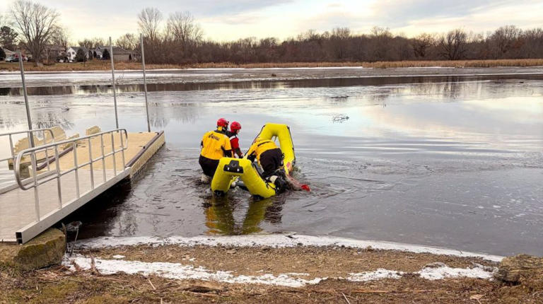 Volunteer firefighters in Wisconsin rescue deer stranded on a lake