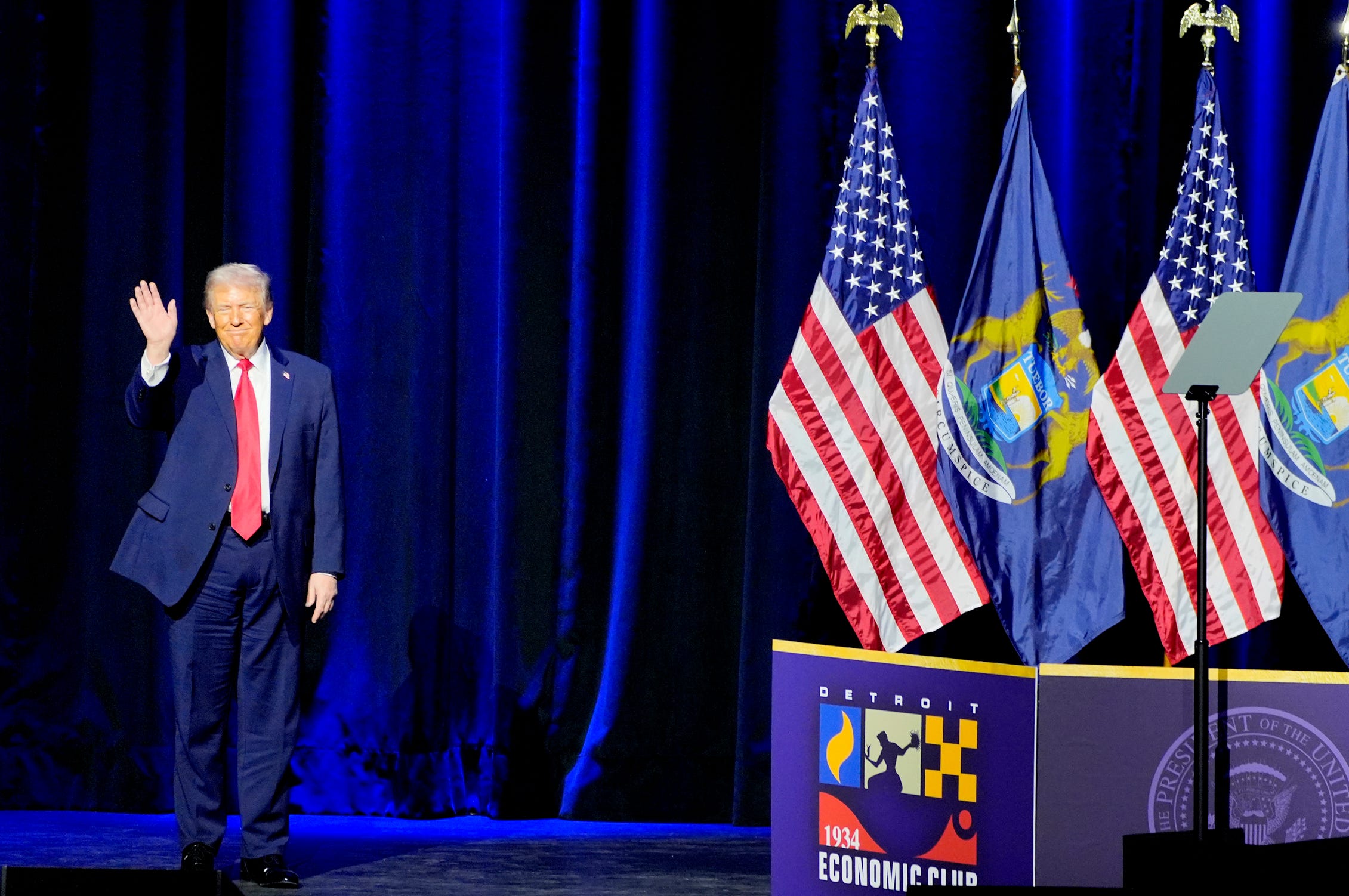 In Detroit speech, Trump touts an economic boom invisible to many