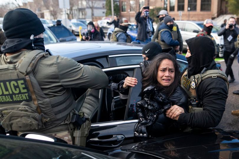 Shocking moment 8 ICE agents drag petrified 'disabled' woman from car ...