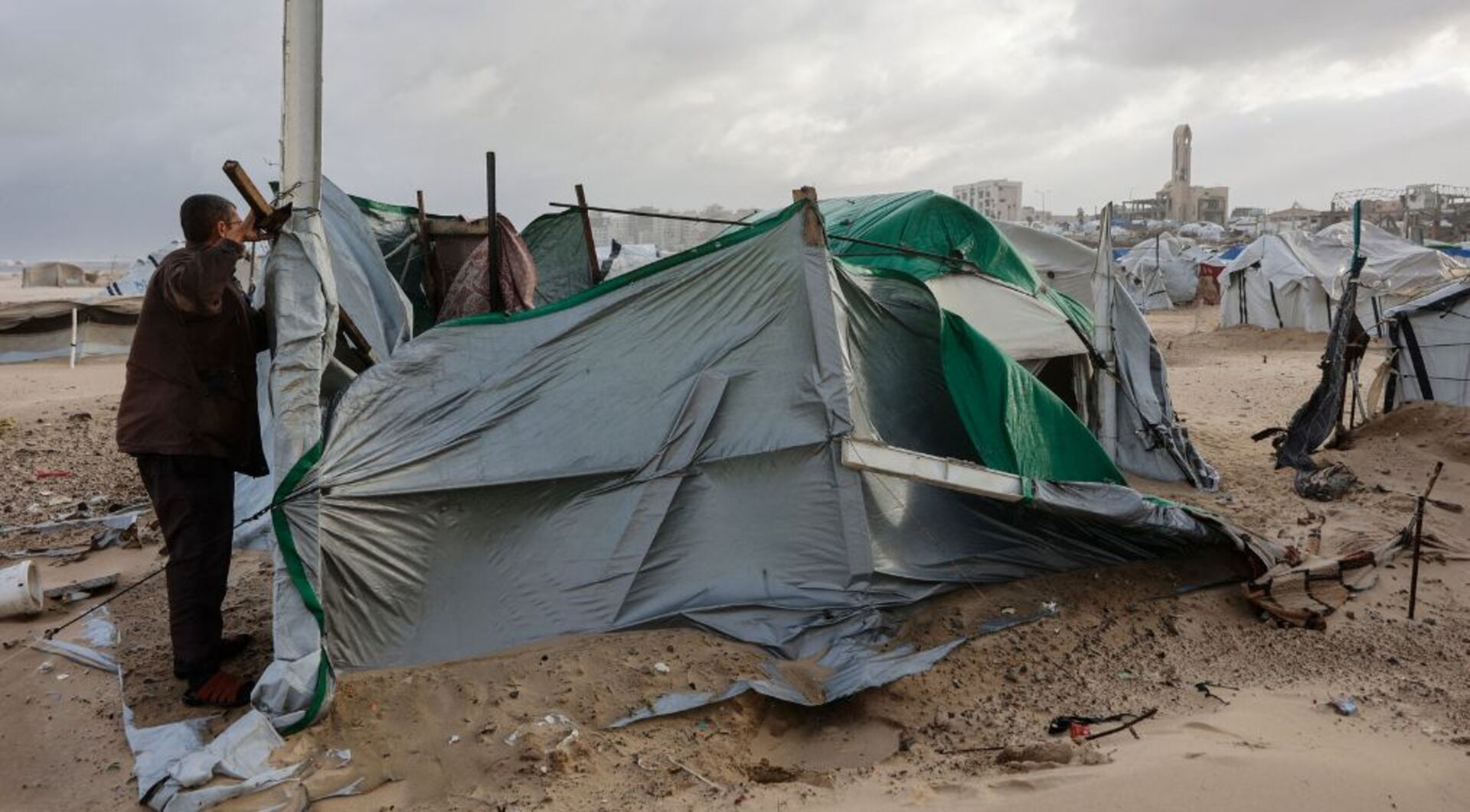 Collapsing tents and harsh winter storms worsen conditions for Gaza ...