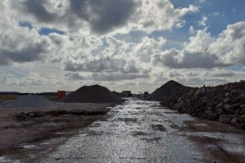 Firm storing tonnes of waste on former airfield told it can't continue