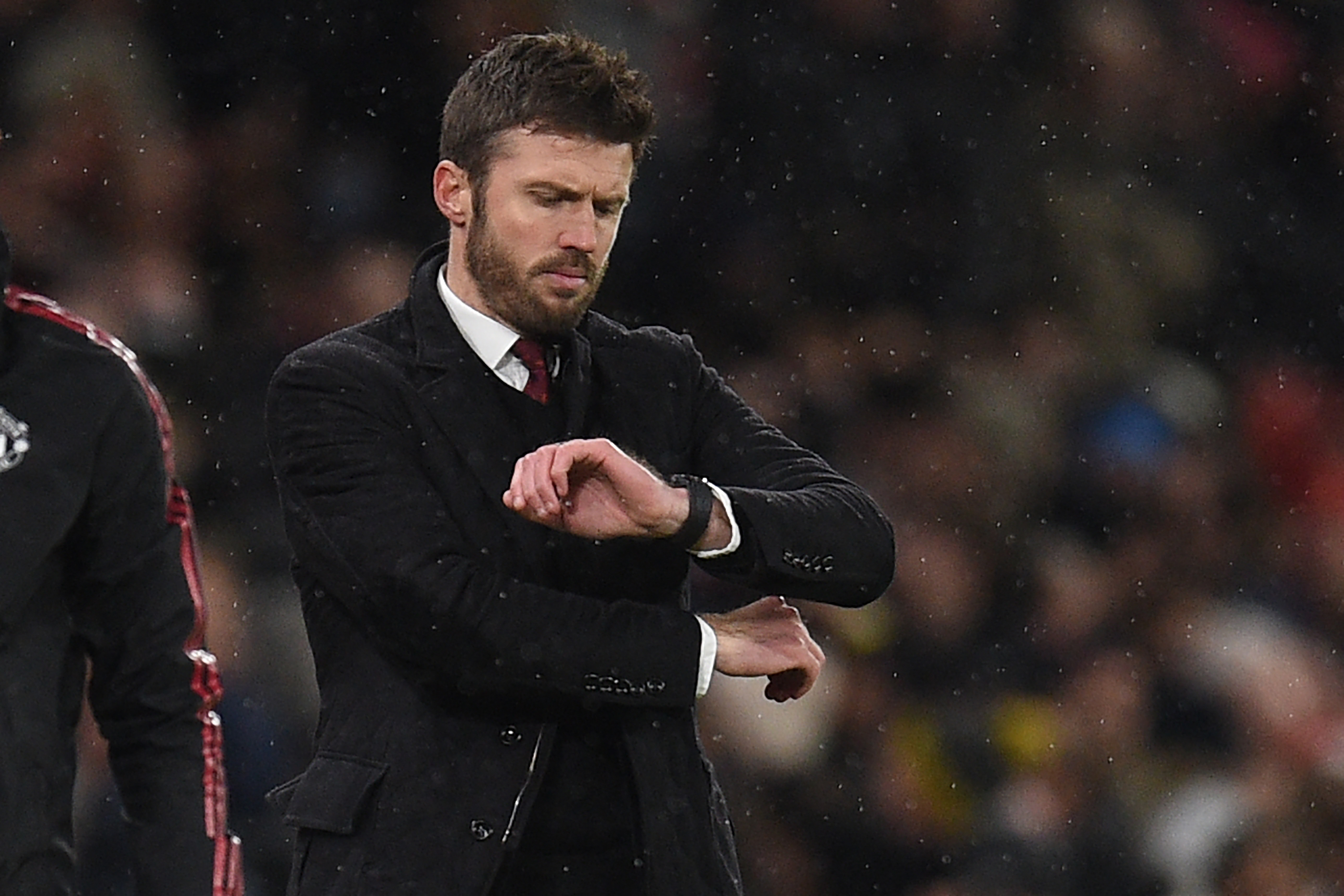 Michael Carrick in charge through end of season, backroom staff named