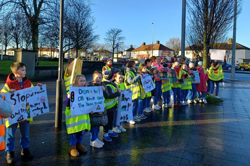 Primary school children hold protest against dangerous driving in north ...