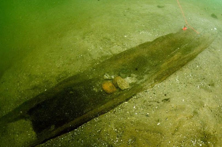 Ancient boats found beneath lake 'older than Egyptian pyramid' that ...
