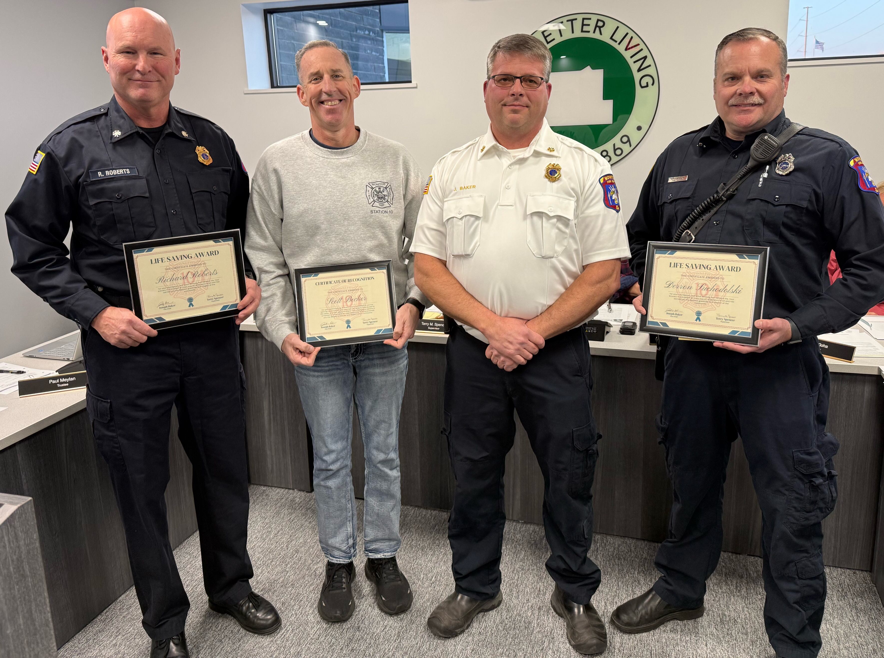 Monitor Township firefighters credited with saving a life