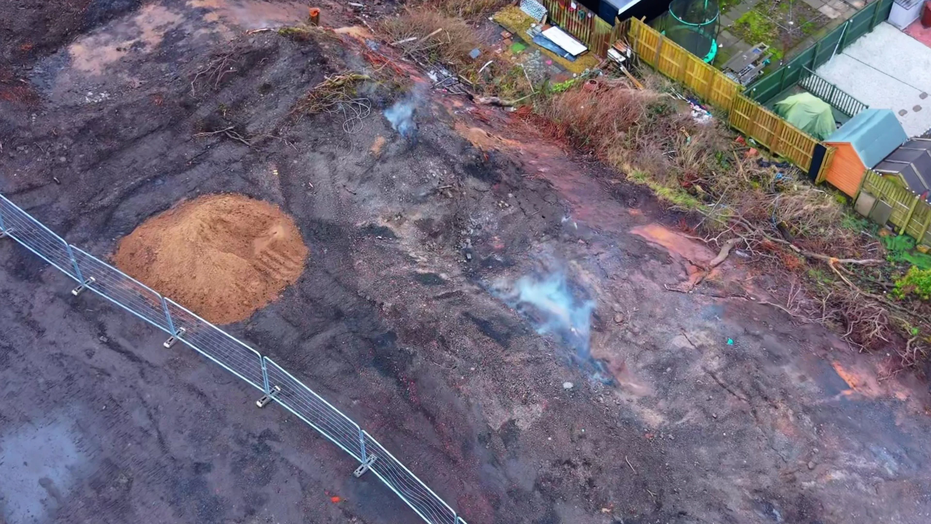 Underground coal fire burns near homes for six months