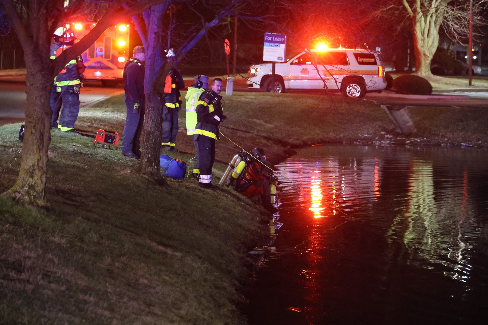 Father dead, two children rescued from retention pond in Indianapolis