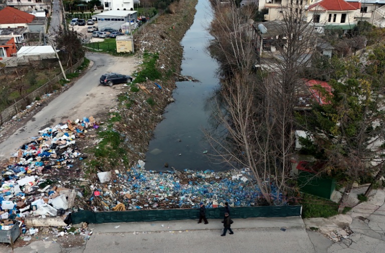 Albania's waste-choked rivers worsen deadly floods