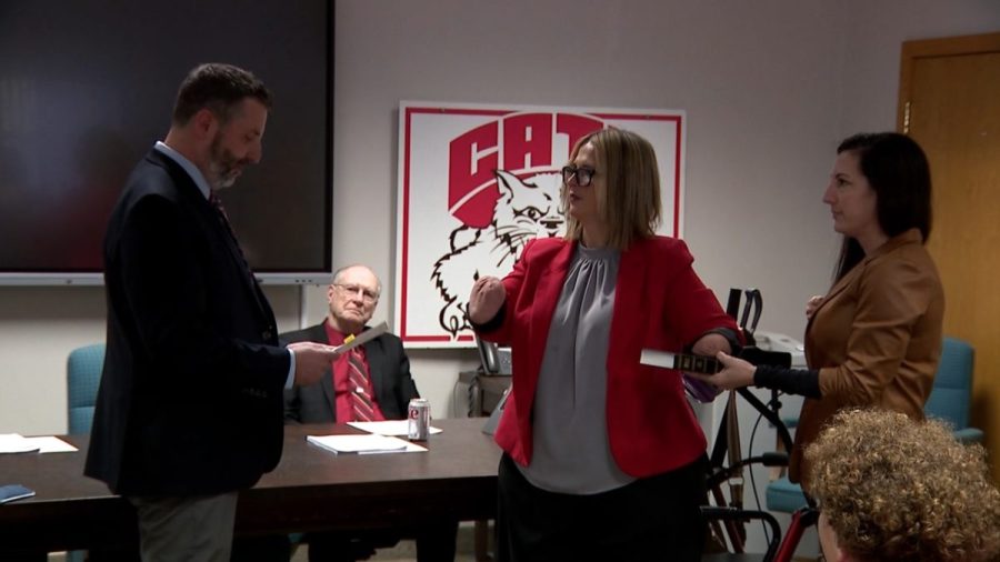 Woman who lost all 4 limbs sworn into school board