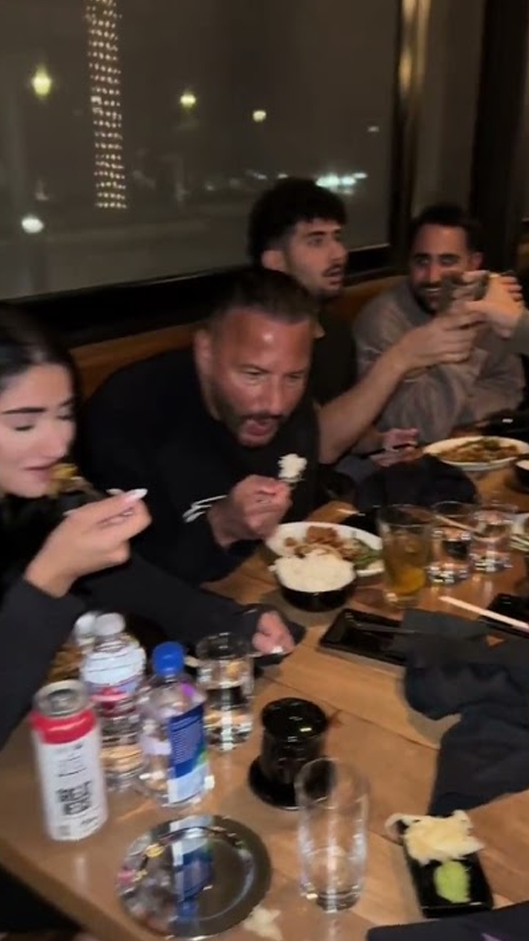 The first person that moves needs to pay the restaurant bill