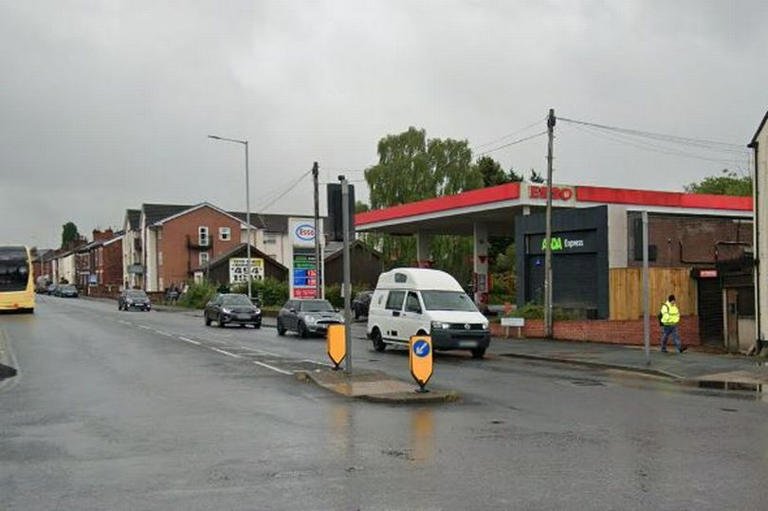 Road taped off at Stockport as emergency crews race to scene