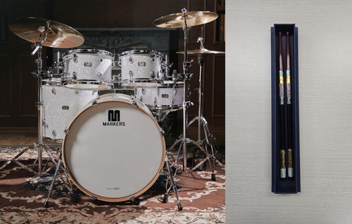 Lee gifts Japan's Takaichi with drum set