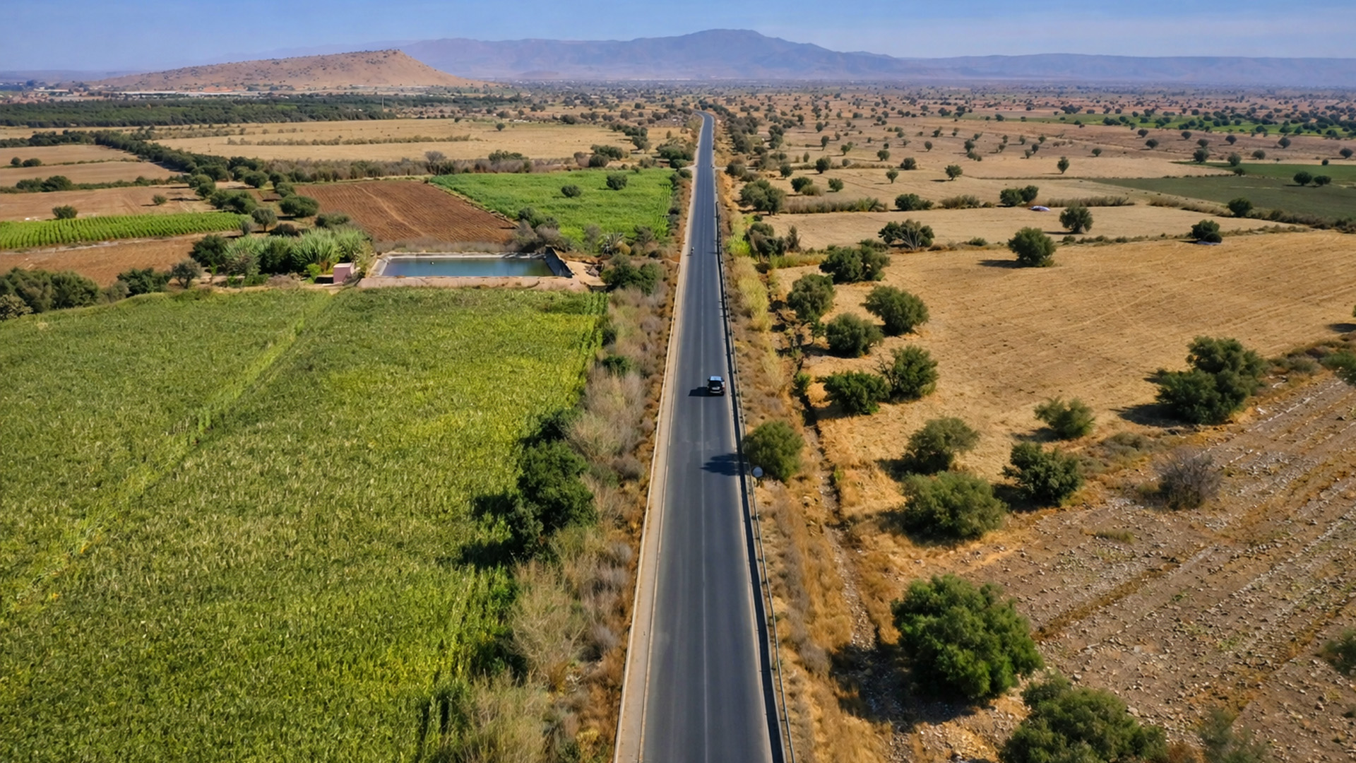 Green farmland and dry plains outside Marrakech