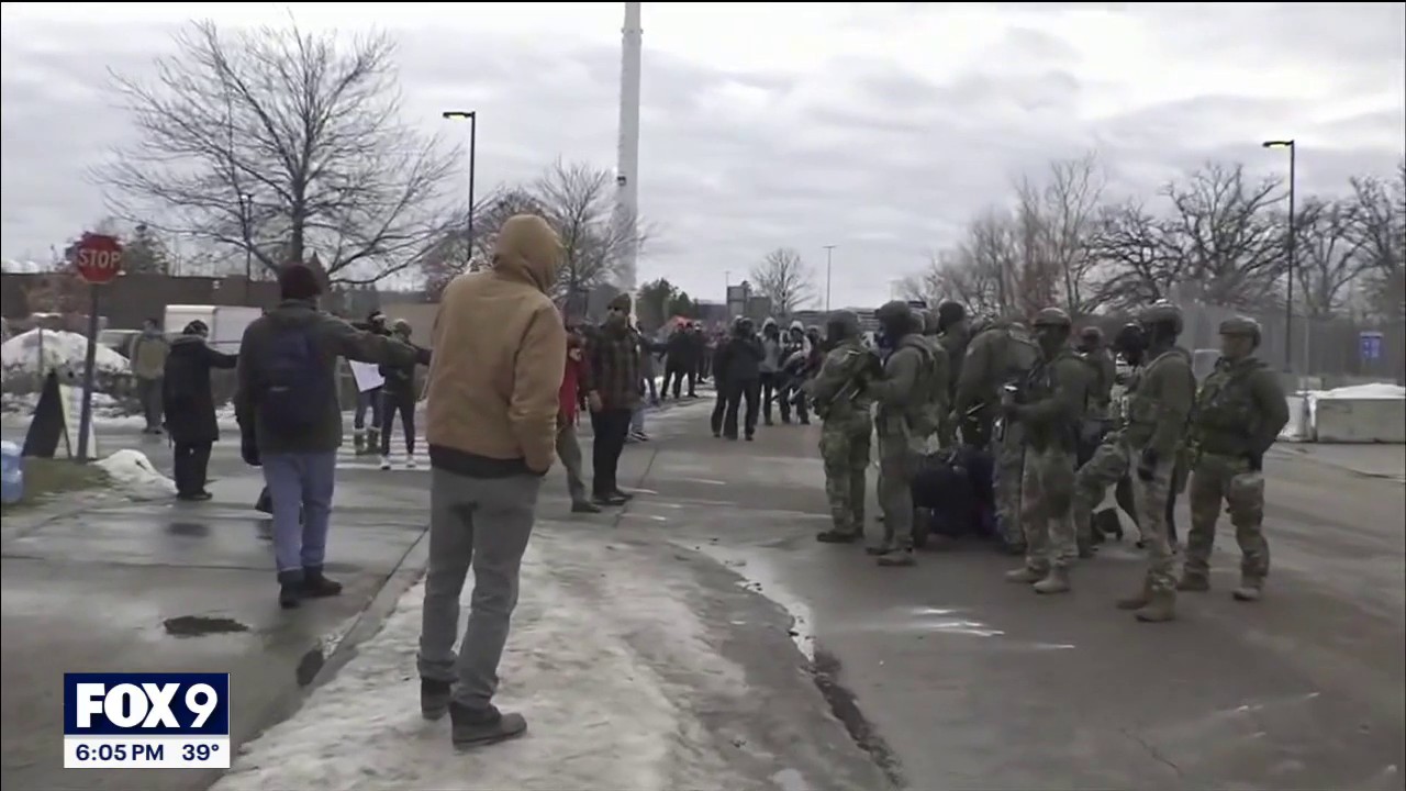 Tensions rise between protesters and agents in Minneapolis