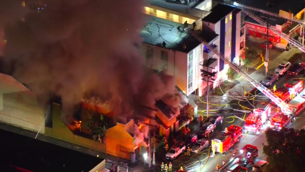 Fire at boarded-up church threatens North Hills apartments; residents ...