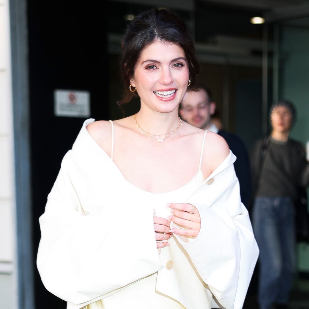 Emily Bader nails rom-com main character dressing in a satin slip dress