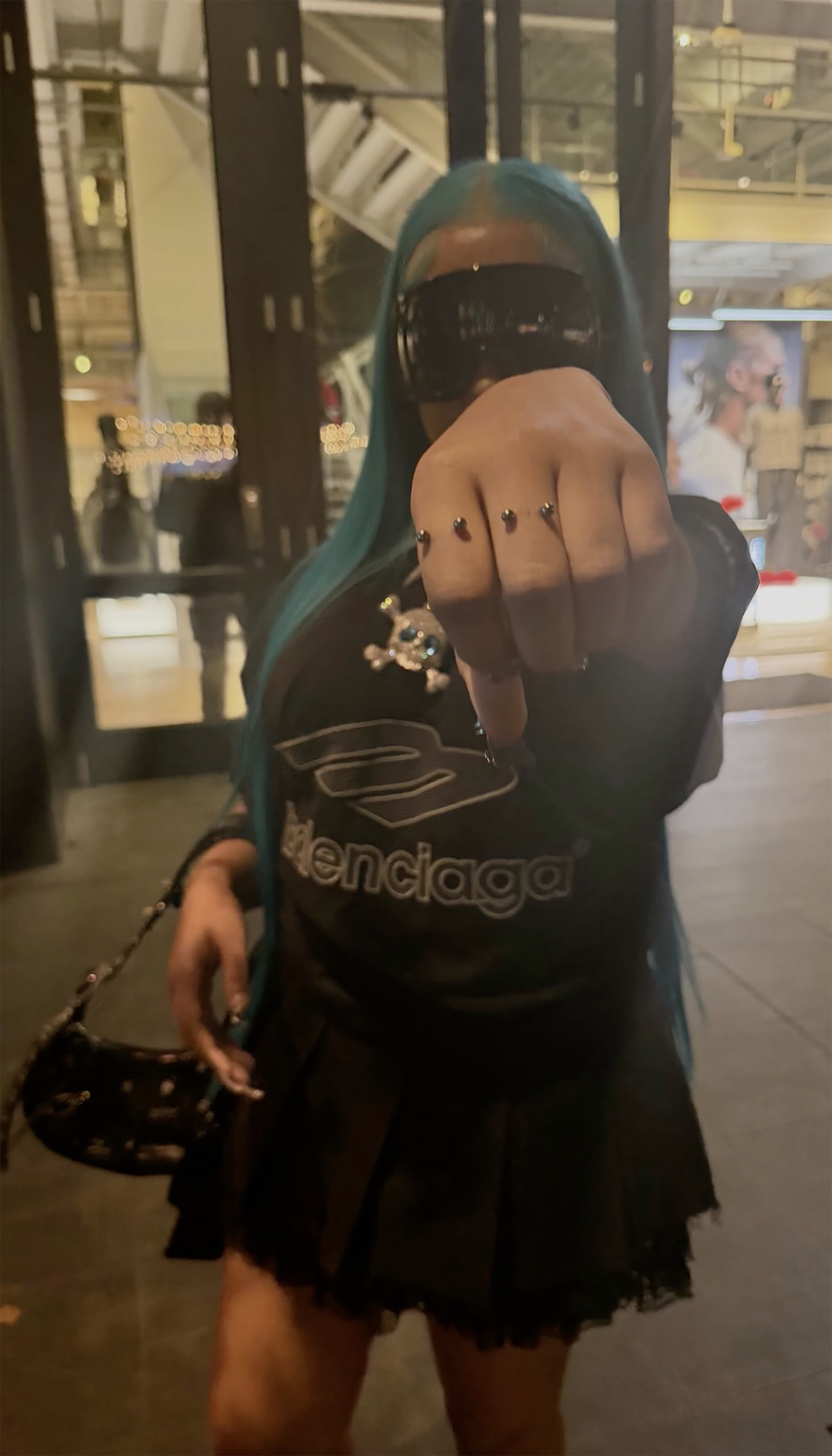 North West sticks it to haters with second finger piercing