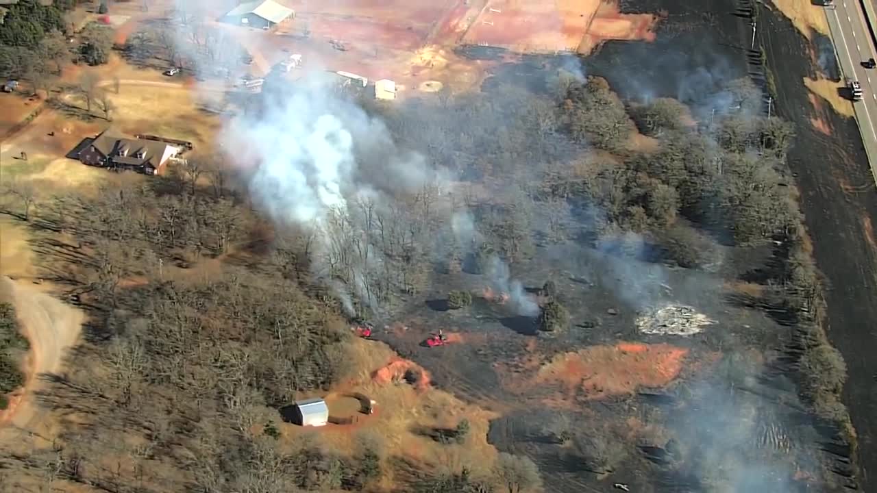 Watch: Sky 5 video shows crews battling grass fire near Jones, Oklahoma