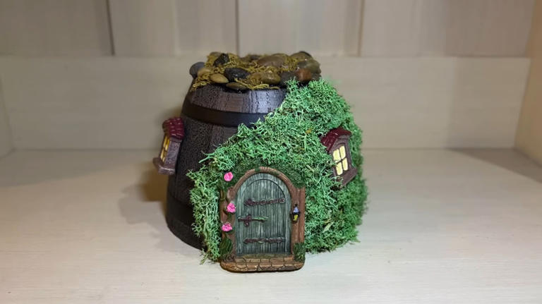 Turn any plant pot into an adorable fairy house with a Dollar Tree DIY