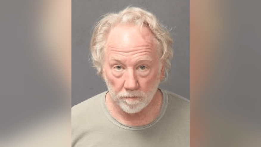 Actor Timothy Busfield turns himself in following arrest warrant