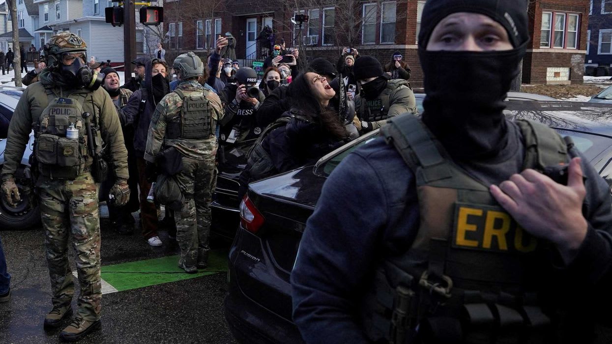 Internet inflamed after ICE agents drag woman out of her car