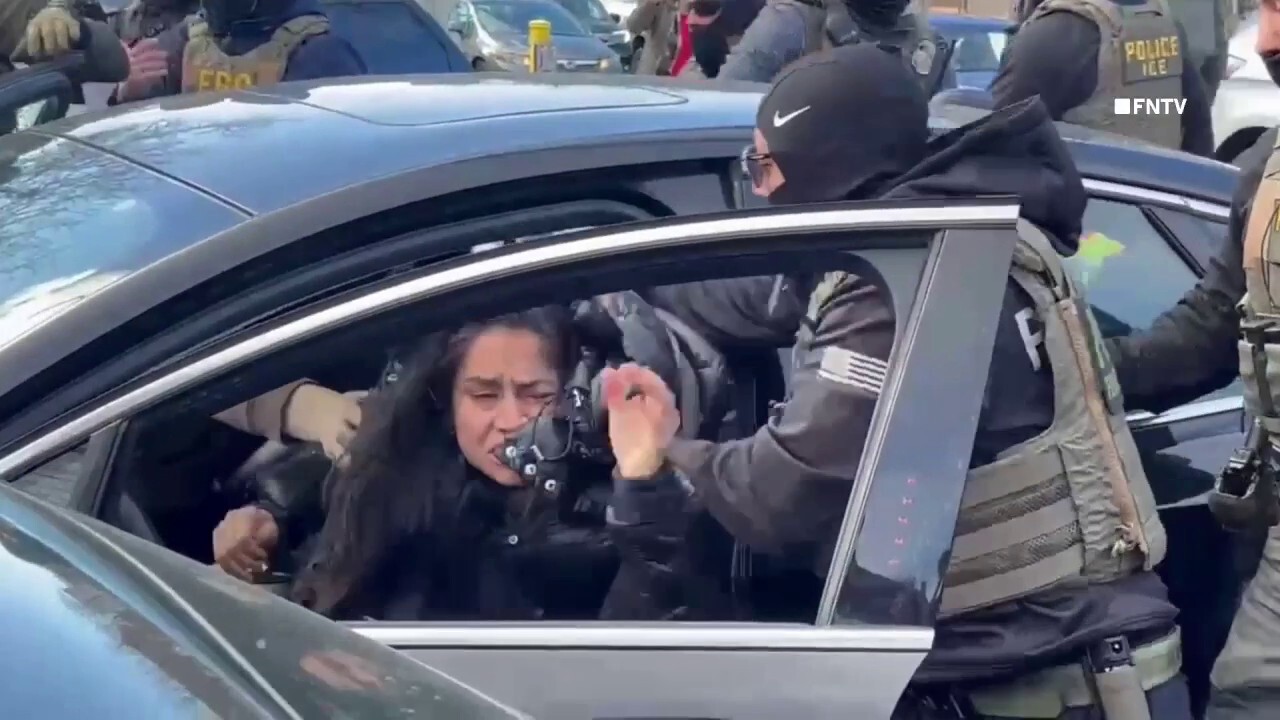 Woman pulled from car after apparently blocking agents in Minneapolis