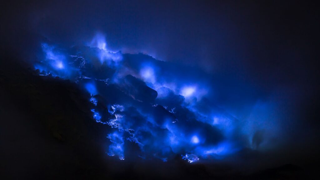 This volcano's lava glows electric blue at night, here's what it really is