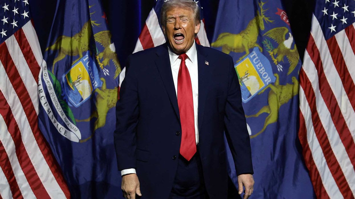 Trump gives middle finger to worker shouting 'pedophile protector'