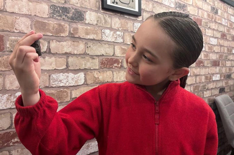 Girl makes extraordinary discovery after picking up rock on Welsh beach