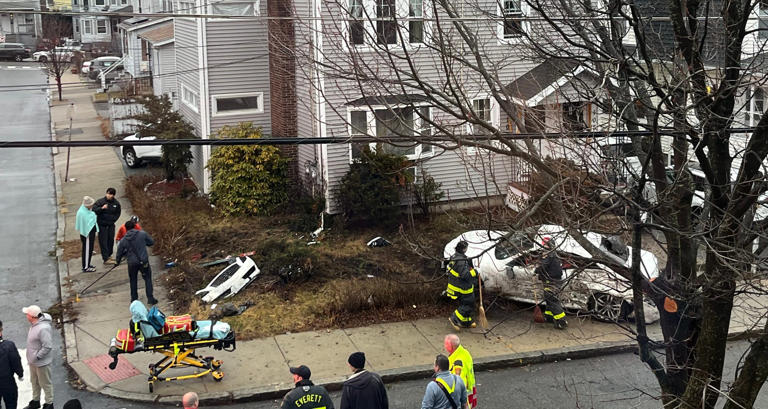 Video shows driver sideswiping houses, falling from car window in Everett