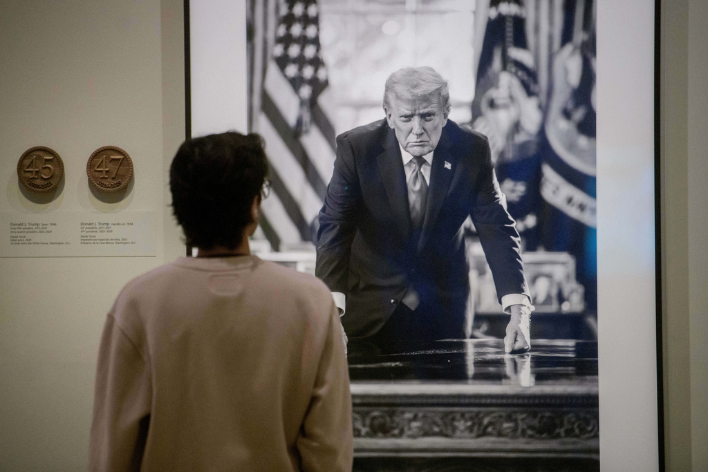 The latest: Trump lashes out at Federal Reserve in speech to Detroit ...