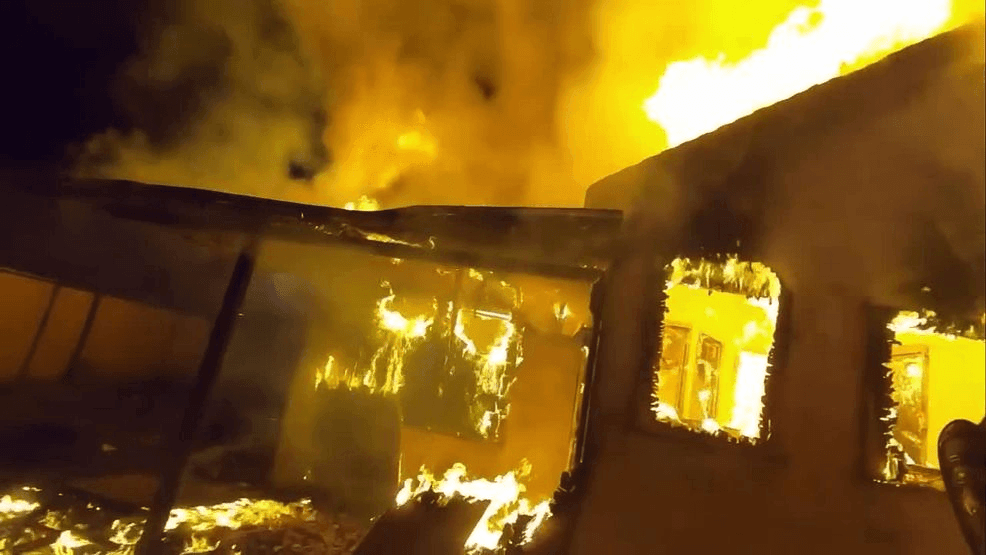 Crews take defensive approach as fire destroy familiar vacant house in ...