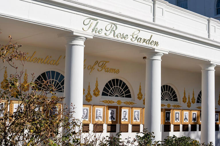 Donald Trump labels the White House Rose Garden by attaching more gold ...