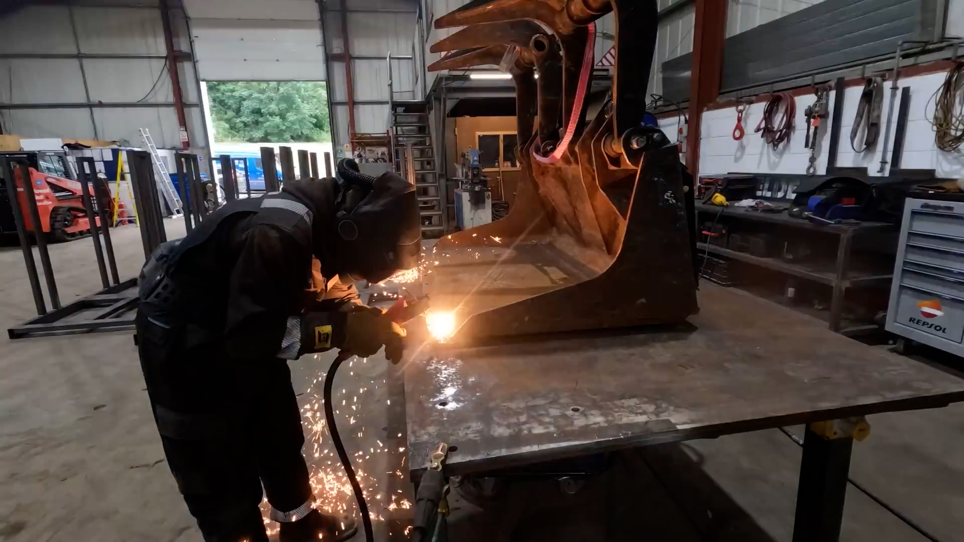 Repairing a worn excavator bucket