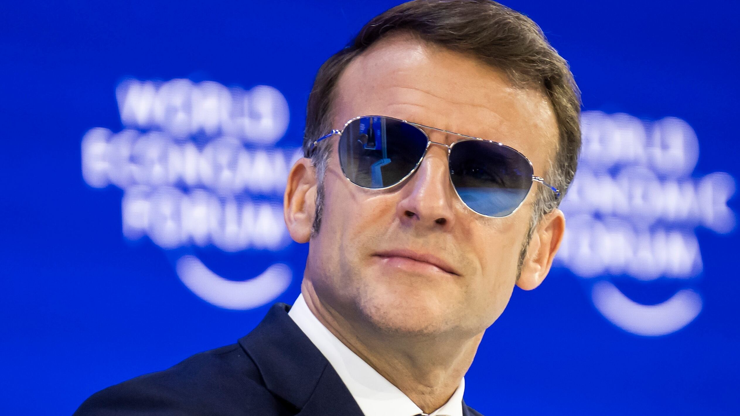 Why is Emmanuel Macron wearing mirrored sunglasses at World Economic ...