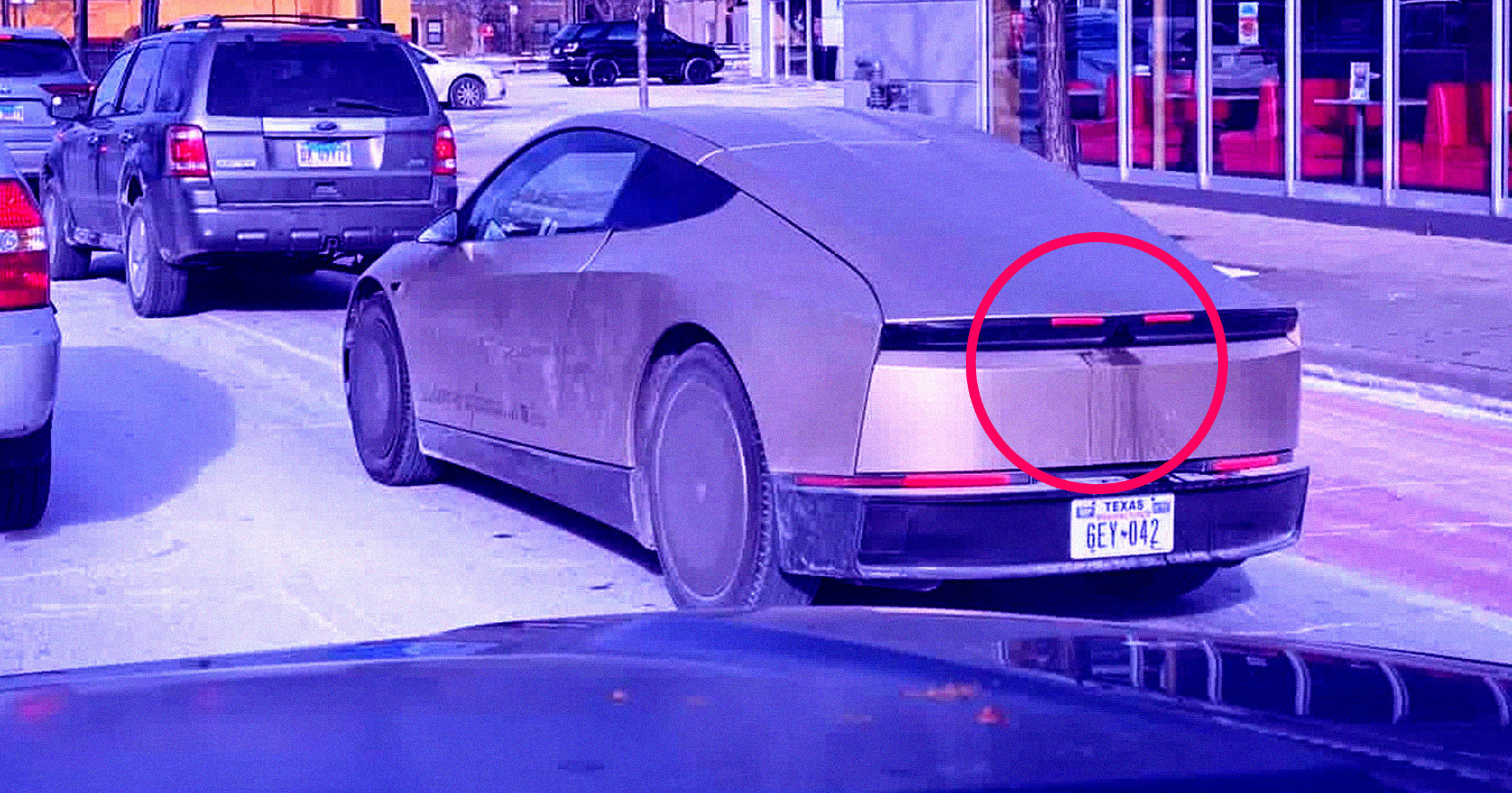 Tesla Cybercab spotted dripping liquid