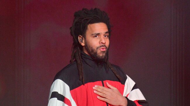 Watch: J Cole confirms album cover in stunning vinyl production video