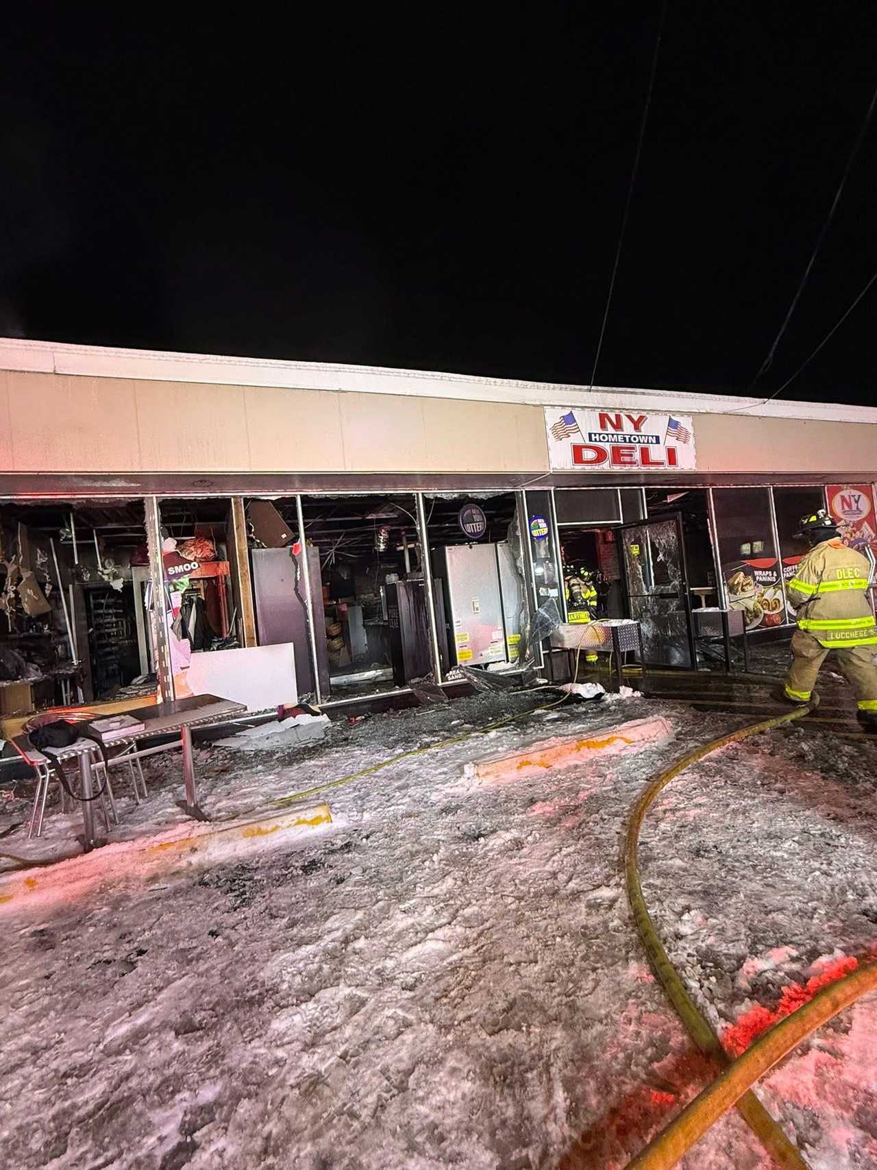 2-alarm fire breaks out at deli across street from firehouse in Orange ...