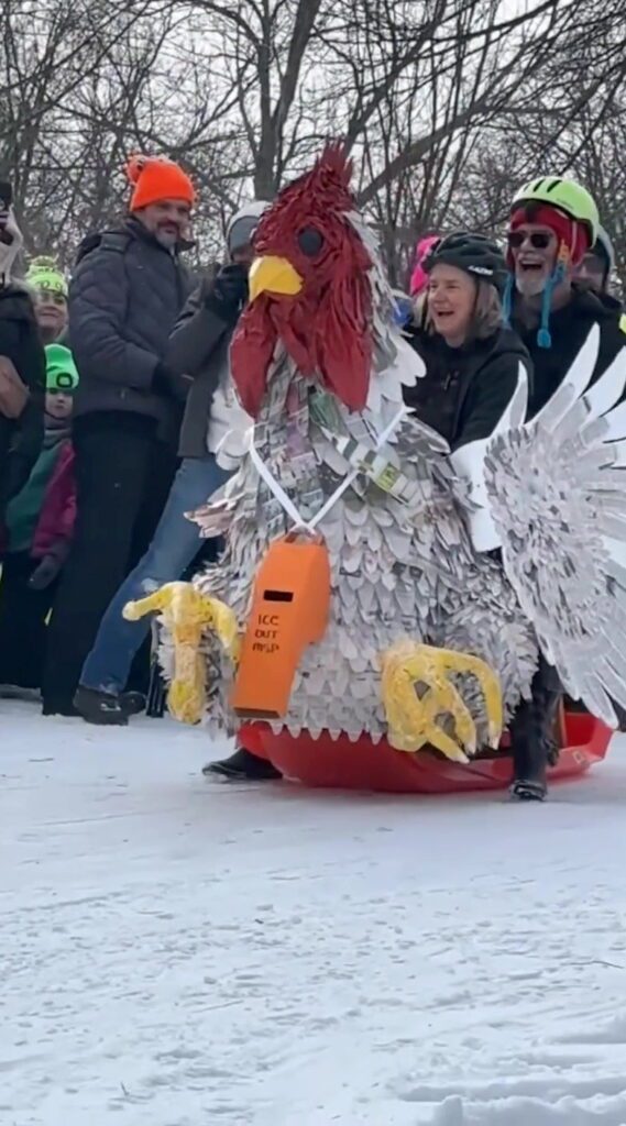 Anti-ICE protestors use annual sled art event to hit out at Trump