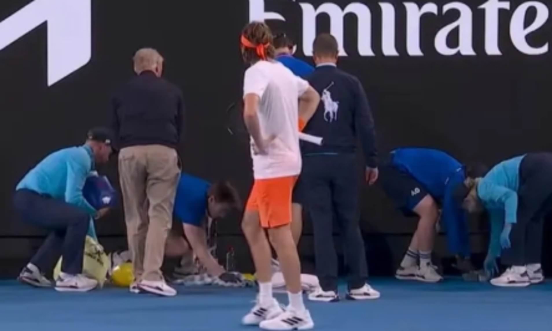 Australian Open match is suspended after ball kid throws up on the court