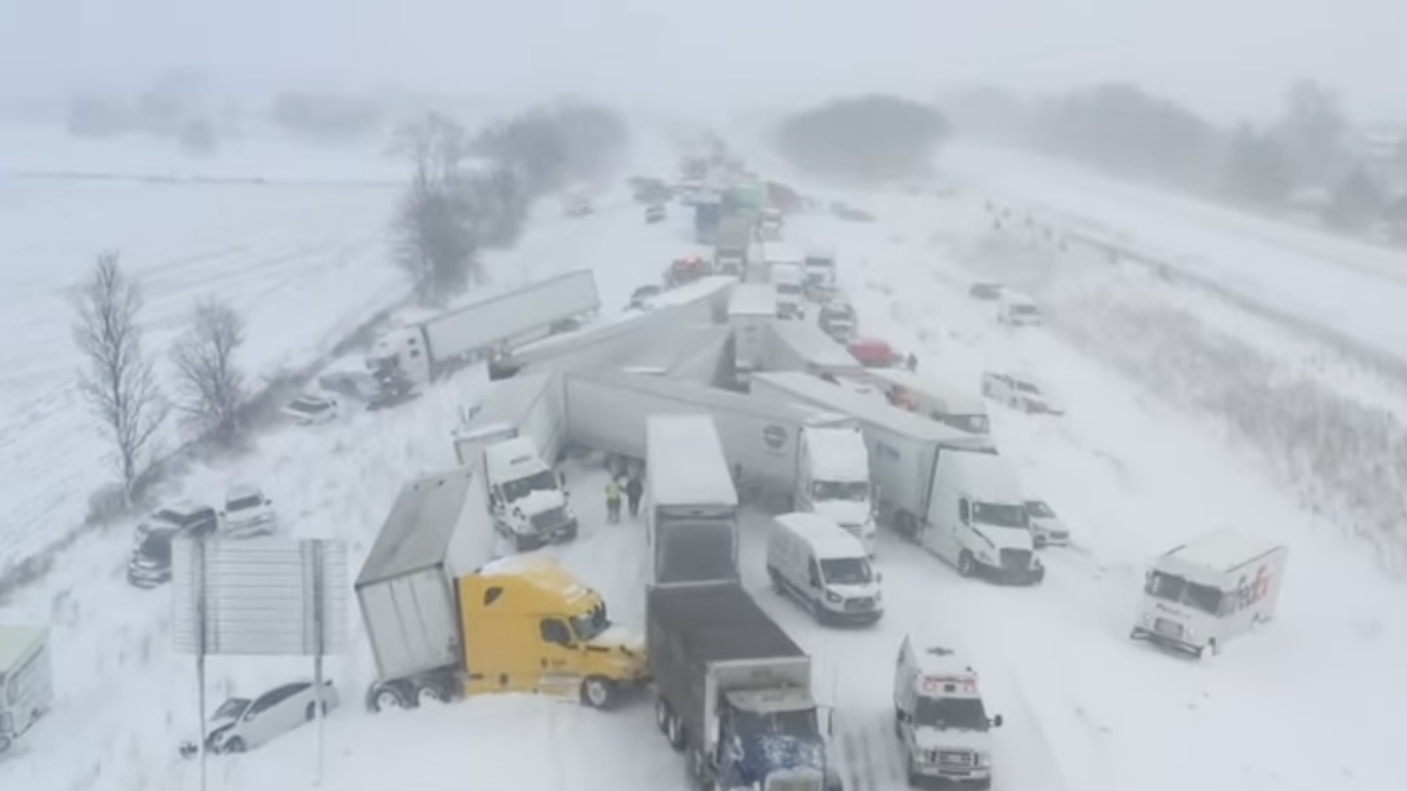 Wild snowstorm creates 100-car pile up amid extreme weather warning