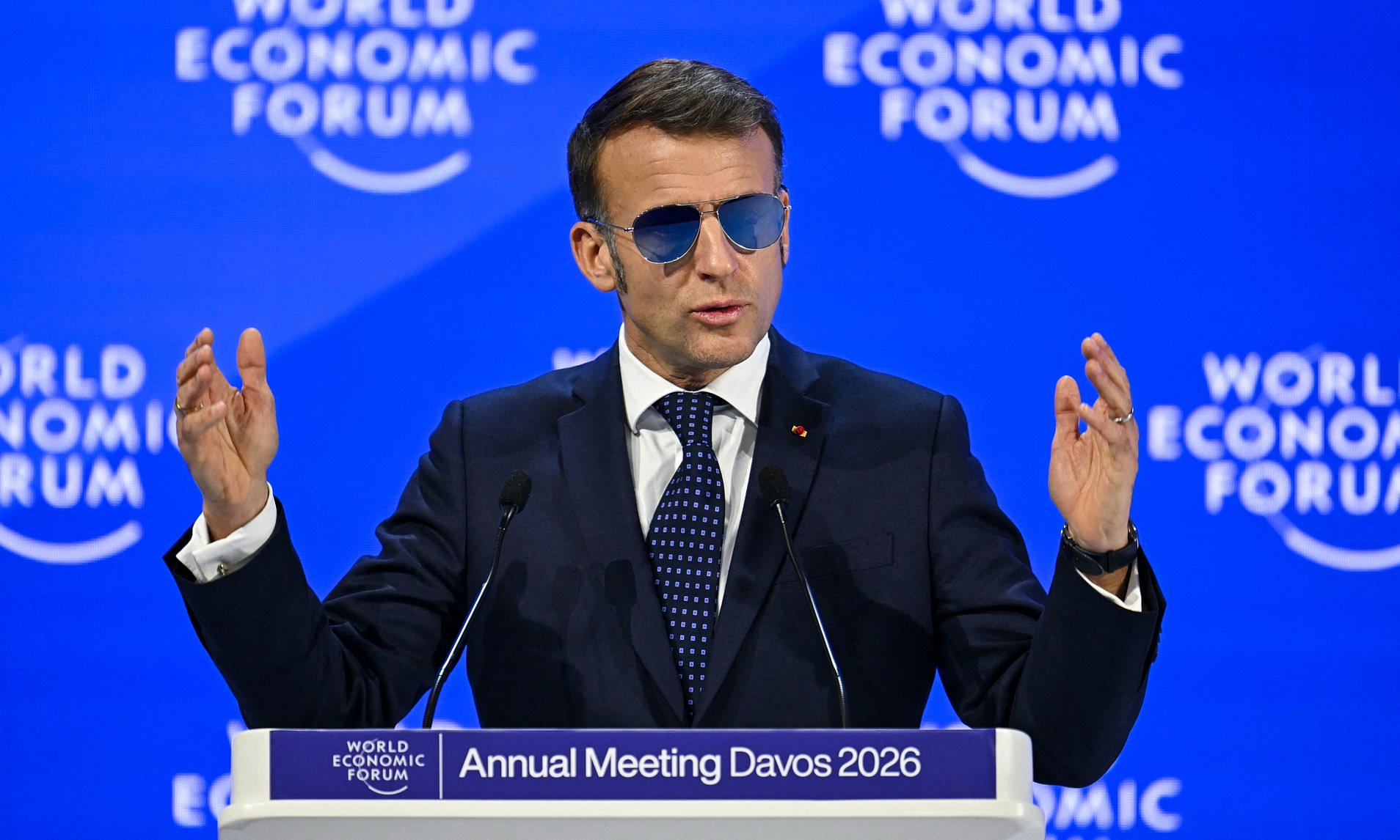 Shades-wearing Macron hits back at Trump and warns 'we're shifting to a ...