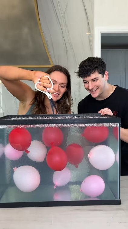 Orbeez balloon proposal in a fish tank