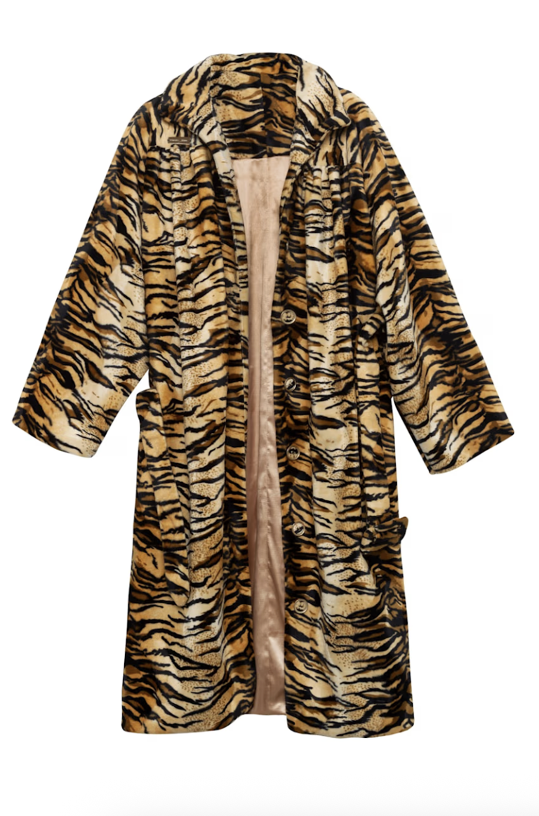 The tiger print trend preys on Rihanna's street style with a $7,050 coat