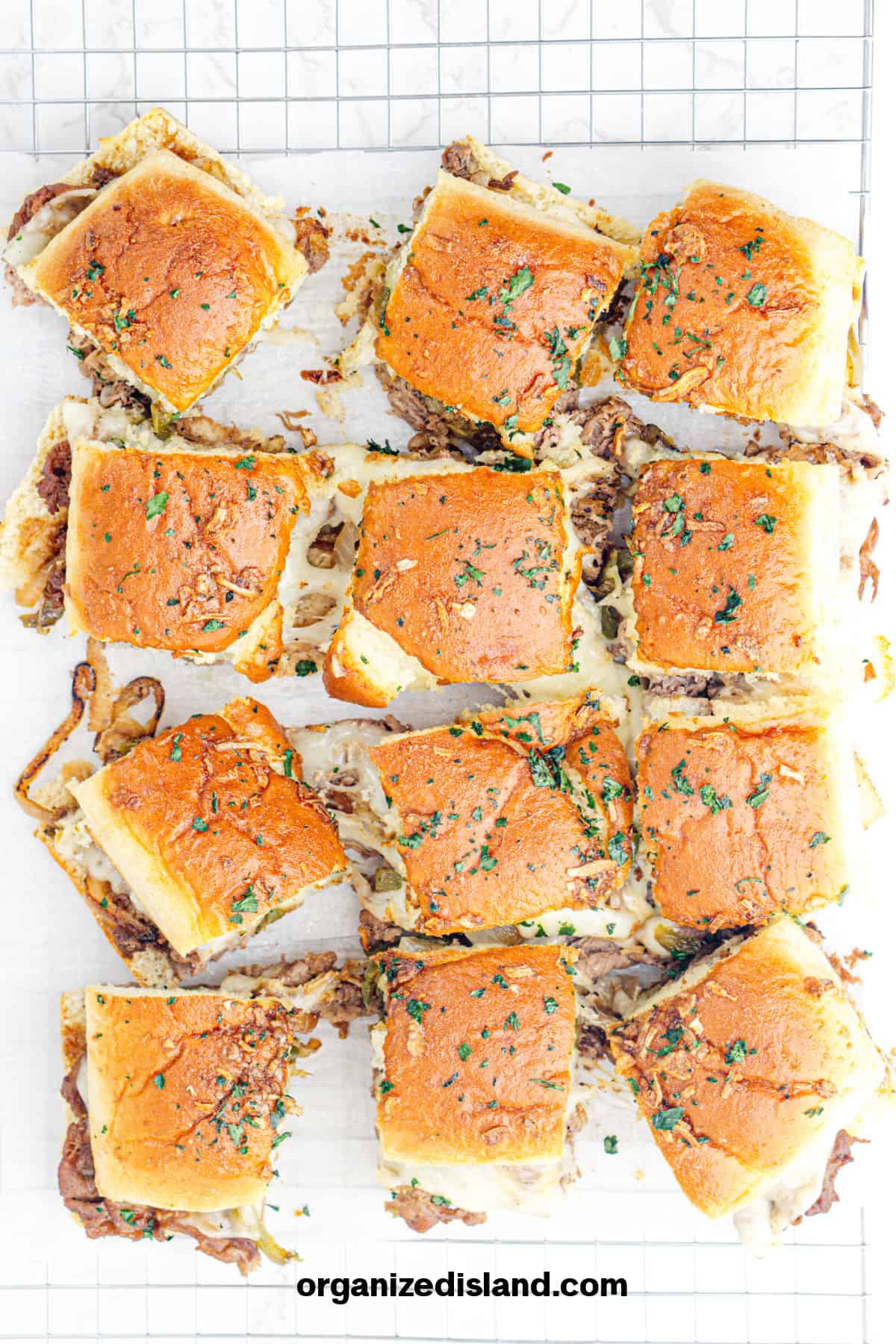 Philly cheesesteak sliders on Hawaiian rolls