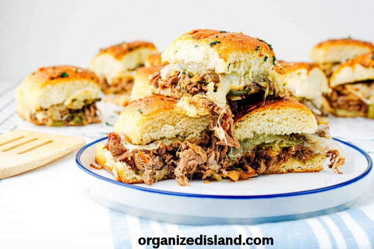 Philly cheesesteak sliders on Hawaiian rolls