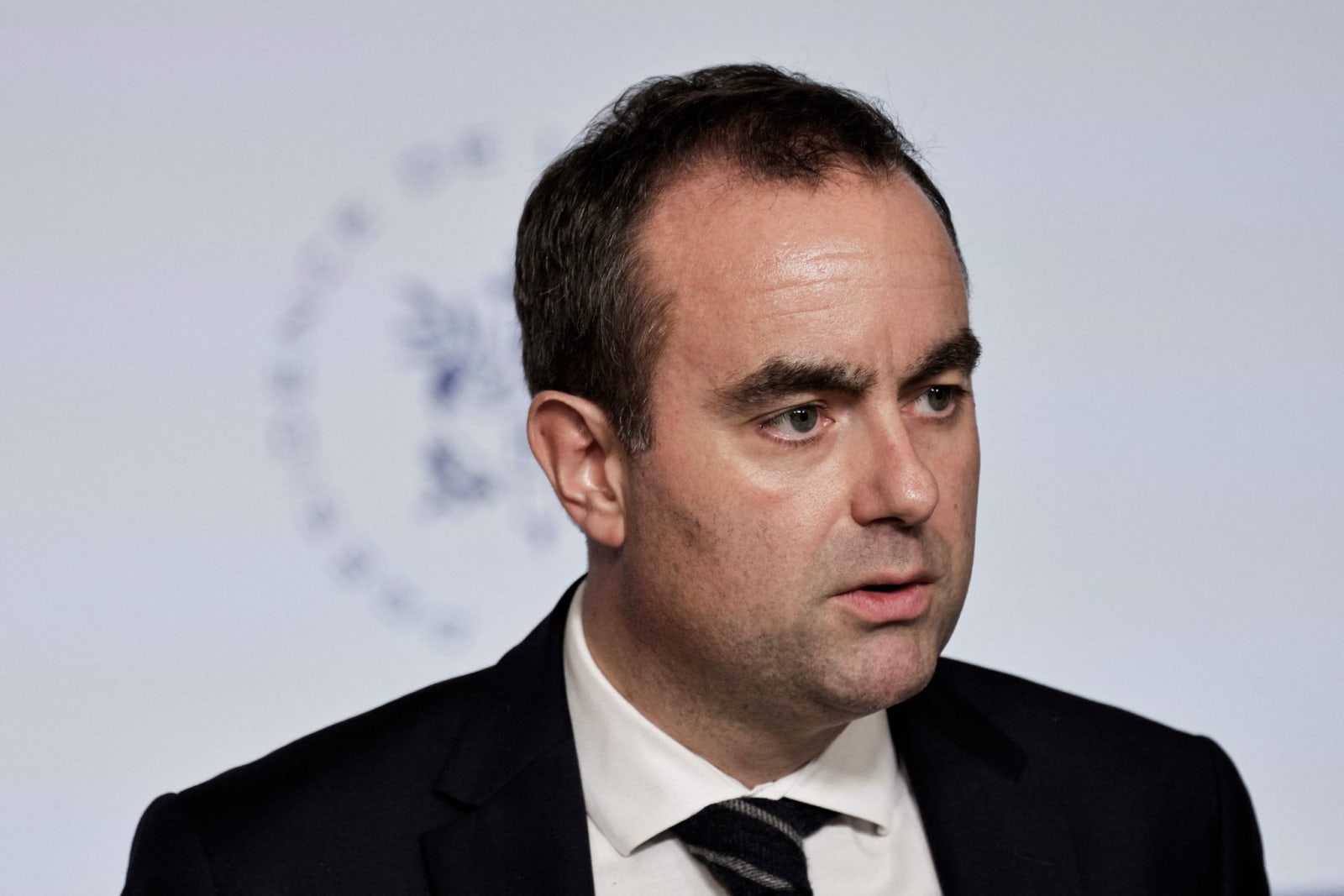 French PM pushes first part of budget through without vote